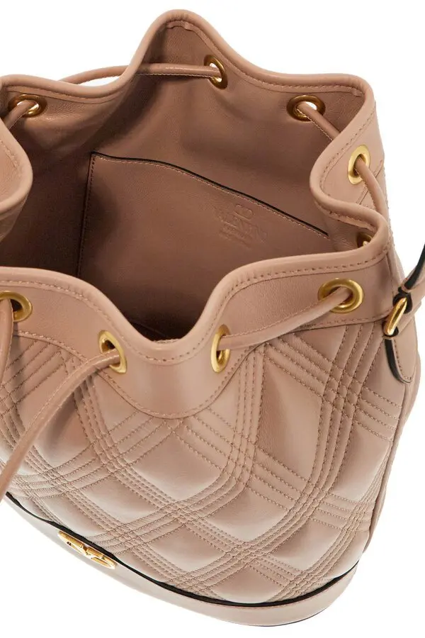 Valentino Garavani Vlogo Plaque Quilted Drawstring Shoulder Bag