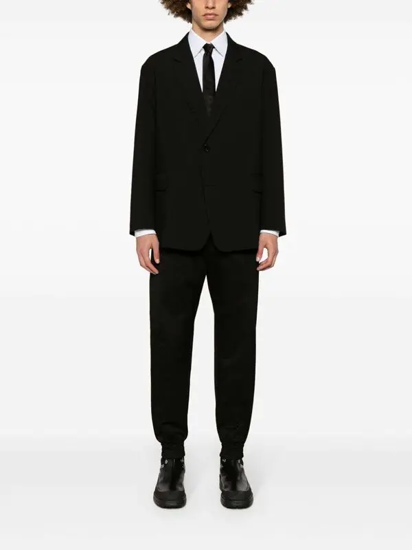 Alexander McQueen Mid-rise Tapered-leg Trousers With Buckled Detail
