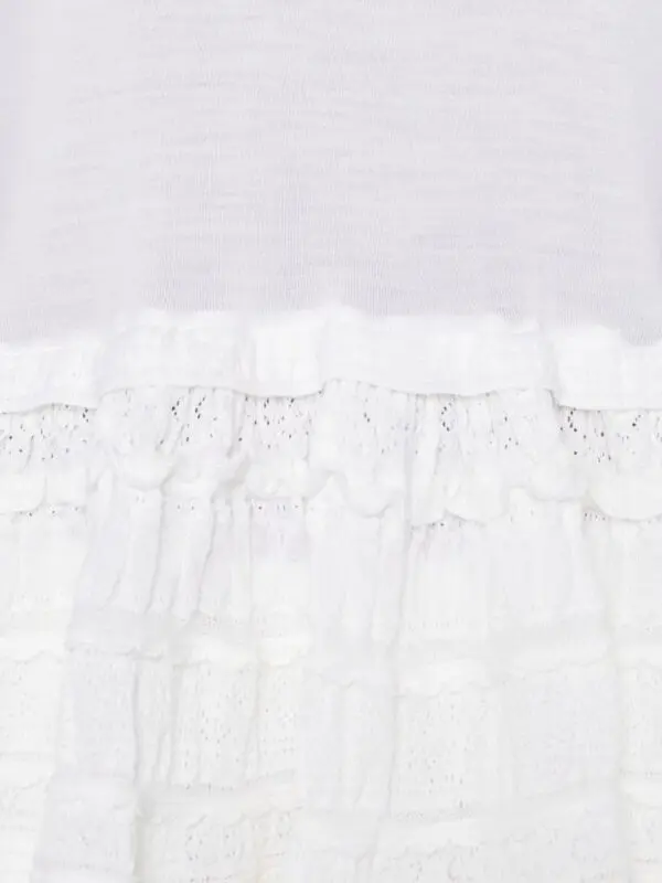Alaïa High Neck Short Sleeve Top With Ruffled Hem - White