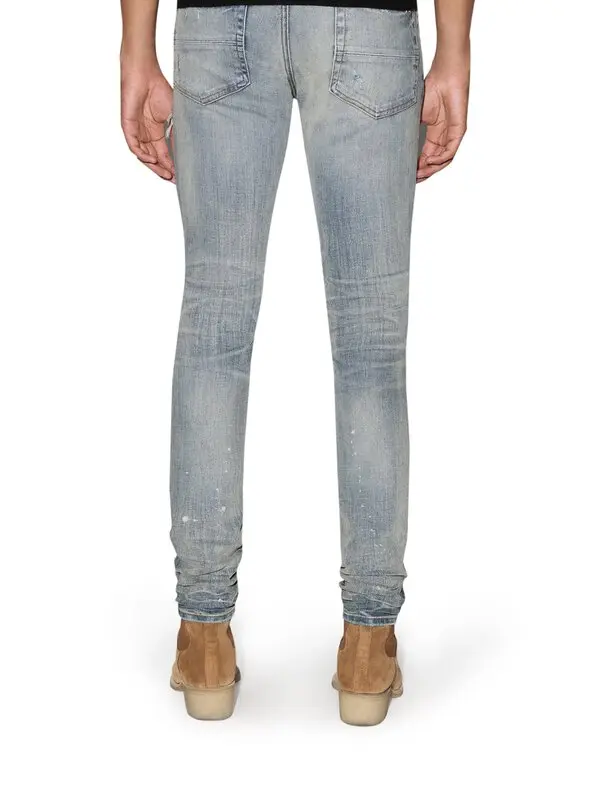 Amiri Distressed Finish Ripped Skinny Jeans - Gray