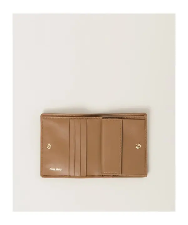 Miu Miu Logo-lettering Matelassé Bi-fold Wallet - Brown