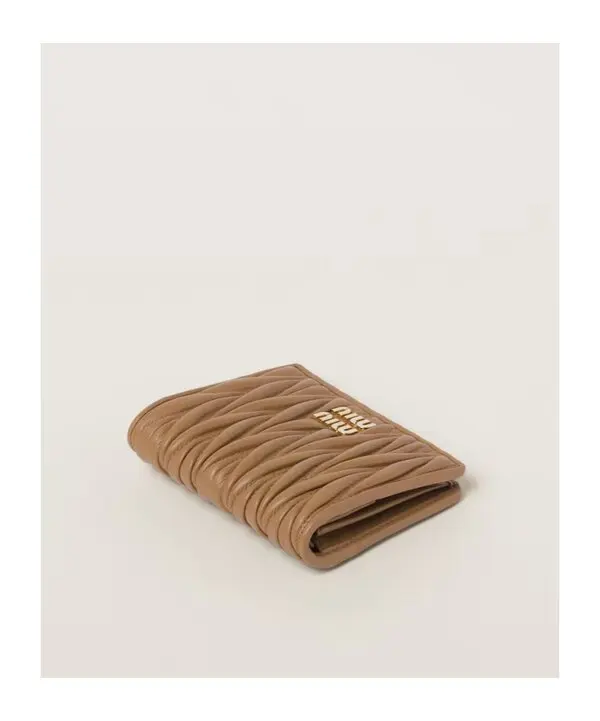 Miu Miu Logo-lettering Matelassé Bi-fold Wallet - Brown