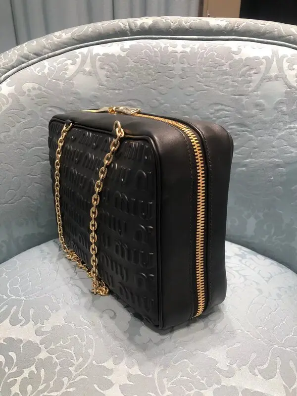 Miu Miu Embossed Leather Top-handle Bag
