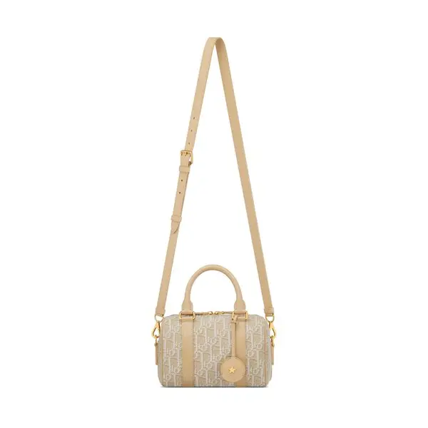 Dior Monogrammed Canvas And Leather Boston Bag - Nude