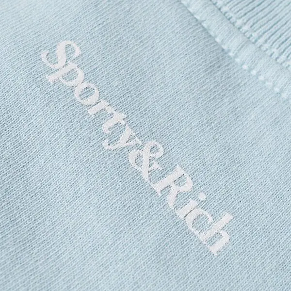 SPORTY  RICH Sporty & Rich Long Sleeve Crewneck Sweater