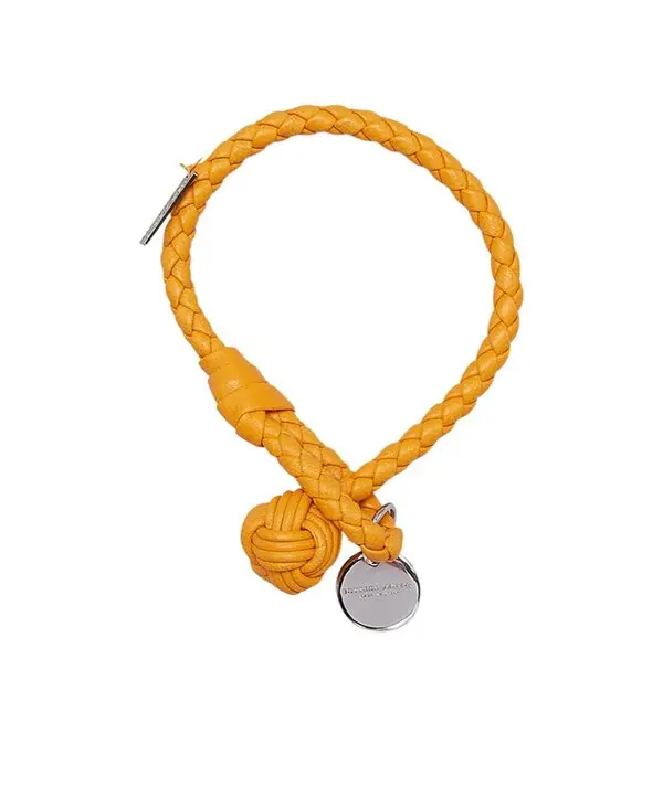Bottega Veneta Braided Leather Handstrap With Logo Charm - Orange