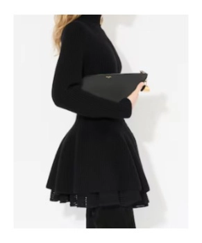 Alaïa Flared Ribbed Knit Zip-up Cardigan With High Collar