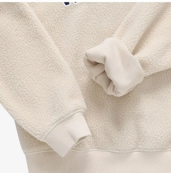 SPORTY  RICH Sporty & Rich Sherpa Wellness Crewneck Sweatshirt