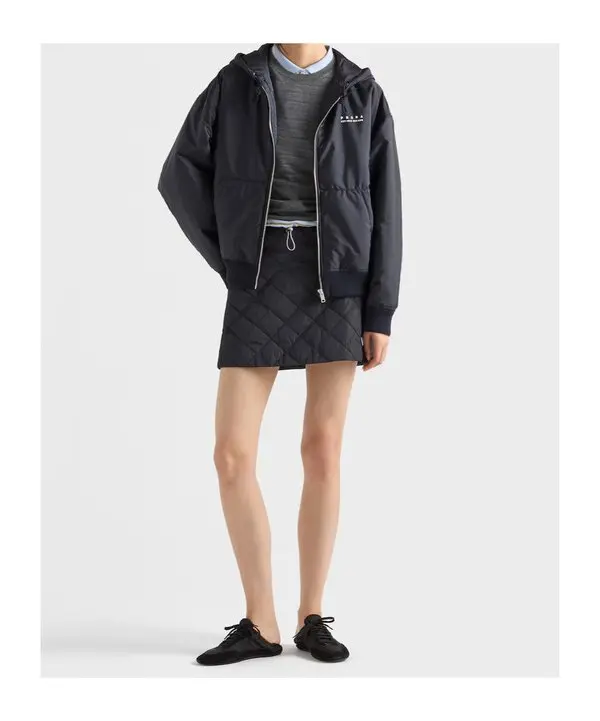 Prada Quilted Mini Skirt With Logo Detail