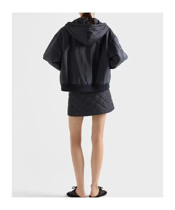 Prada Quilted Mini Skirt With Logo Detail