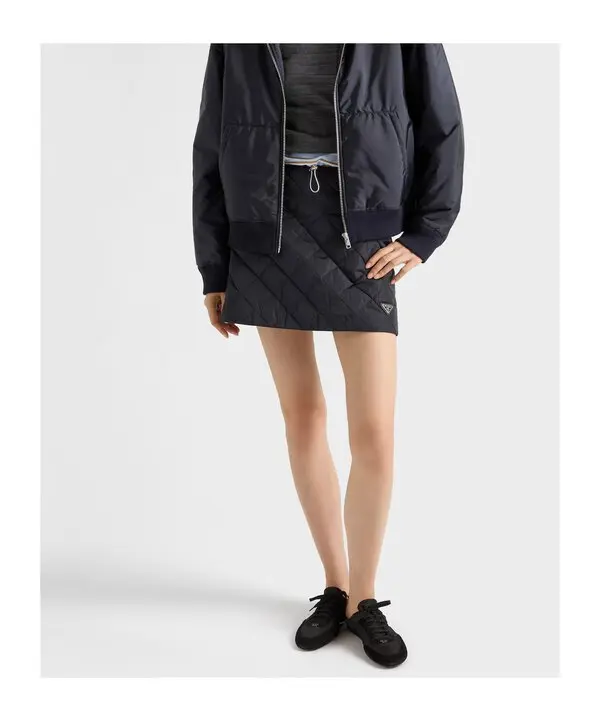 Prada Quilted Mini Skirt With Logo Detail
