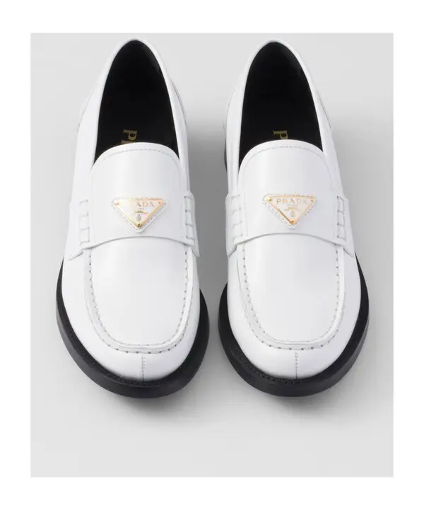 Prada Leather Slip-on Loafers With Enamelled Logo - White