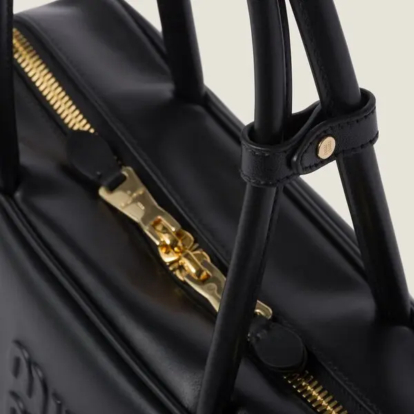 Miu Miu Logo-embossed Zipped Handbag - Black