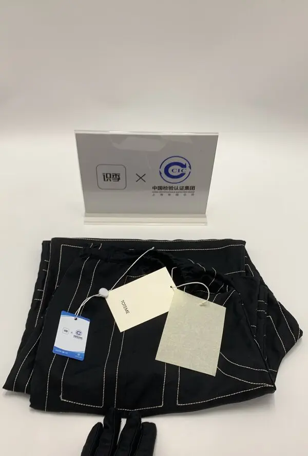 TOTEME Monogram Patterned Wide-leg Silk Pajama Pants - Black