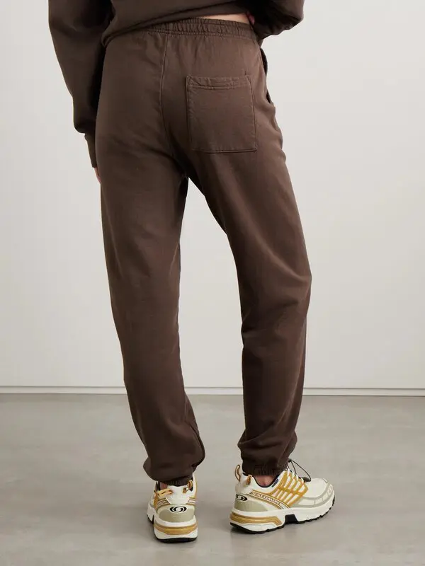SPORTY  RICH Sporty & Rich Printed Jersey Track Pants