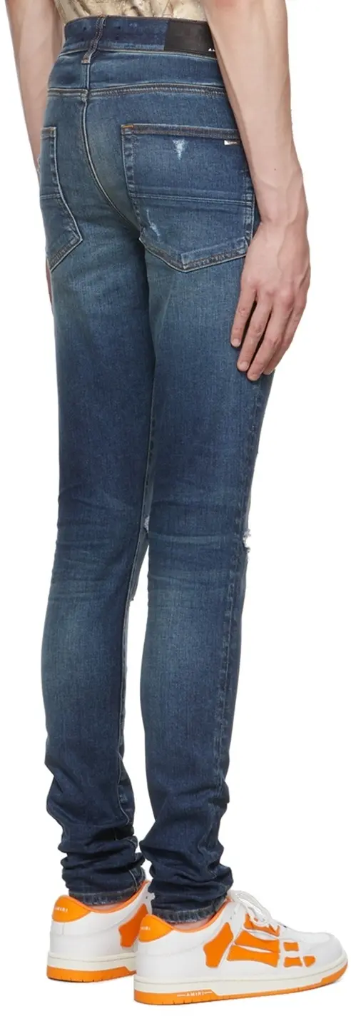 Amiri Ripped-detail Straight-leg Jeans