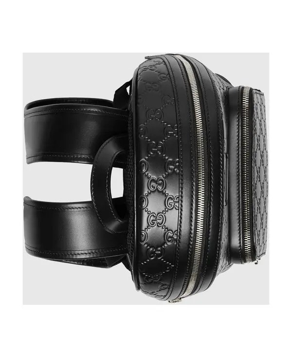Gucci Signature Embossed Leather Backpack