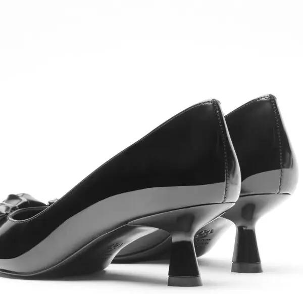 STUART WEITZMAN Pointed Toe High Heel Pumps With Rose Detailing