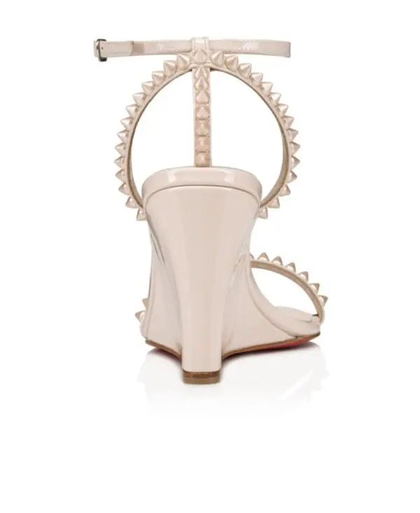 CHRISTIAN LOUBOUTIN Rivet Embellished Patent Leather Wedge Sandals