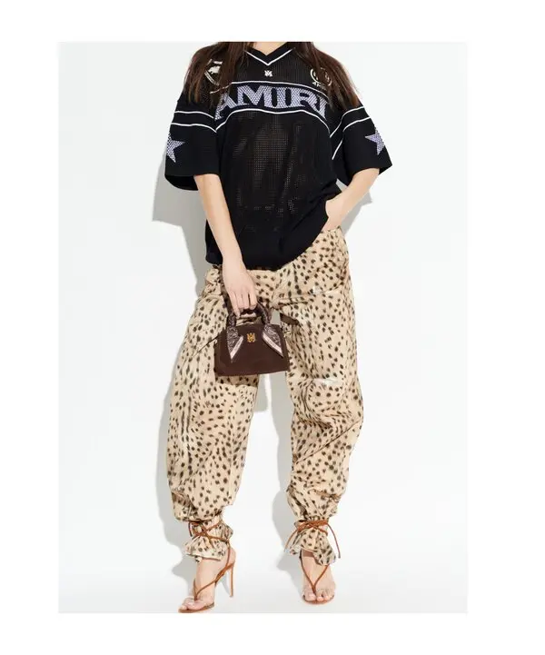 Amiri Logo Patch Wide Leg Jeans - Nude
