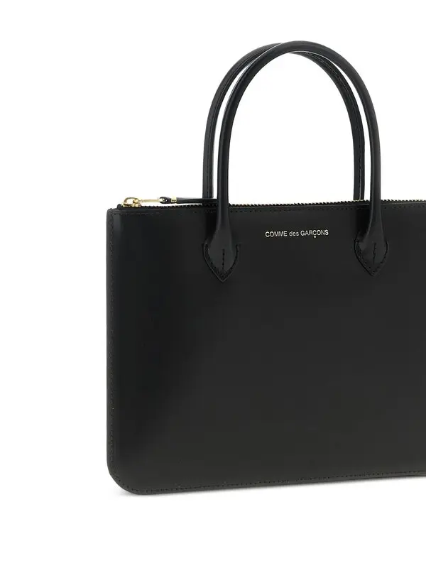 Comme Des Garçons Logo Printed Top Handle Bag - Black