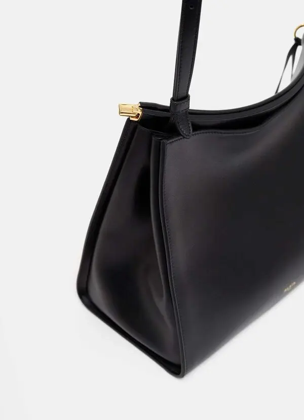 Alaïa Logo Printed Zipped Shoulder Bag