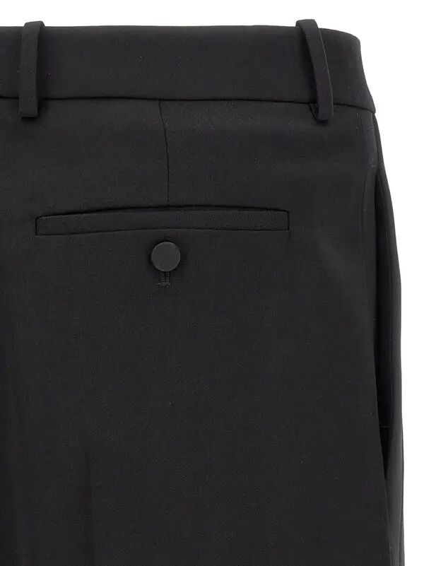 Saint Laurent Wool High-waisted Carrot Leg Pleated Pants With Ribbon Detail