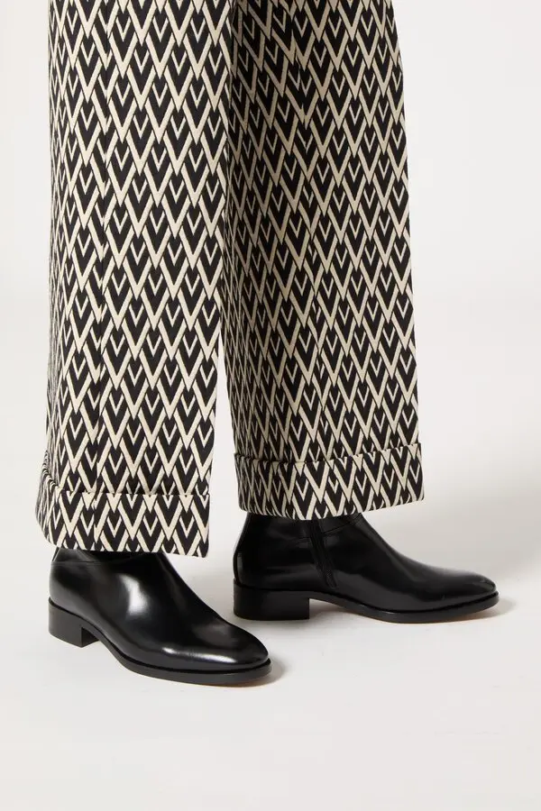 Valentino Garavani Vlogo Plaque Almond Toe Ankle Boots