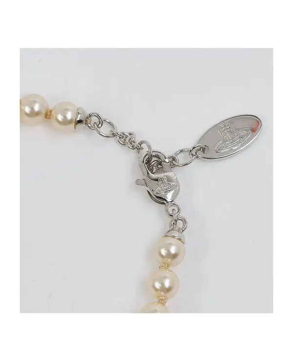 VIVIENNE WESTWOOD Saturn Motif Pearl Bracelet