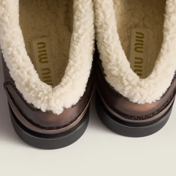 Miu Miu Bleached Leather And Shearling Loafers - Ebony