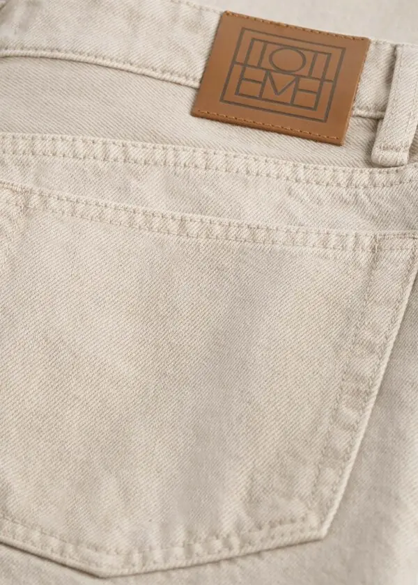 TOTEME Low-rise Tapered Jeans