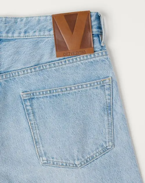 Valentino Garavani Straight Leg Jeans With Logo Patch - Denim