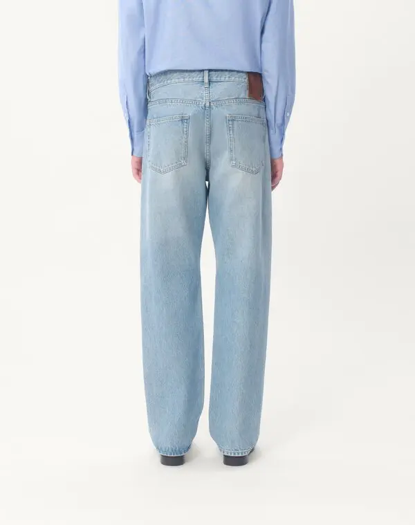 Valentino Garavani Straight Leg Jeans With Logo Patch - Denim