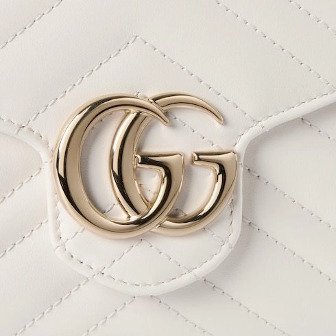 Gucci Logo Plaque Quilted Clutch Bag