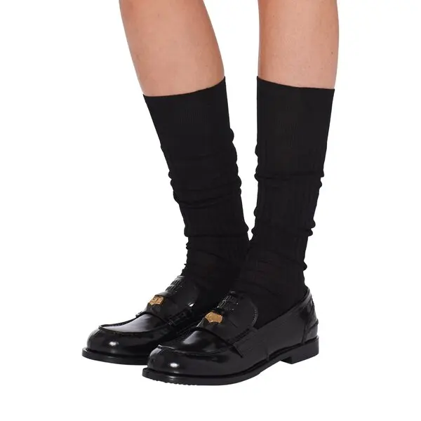 Miu Miu Round Toe Penny Loafers With Embossed Logo - Black