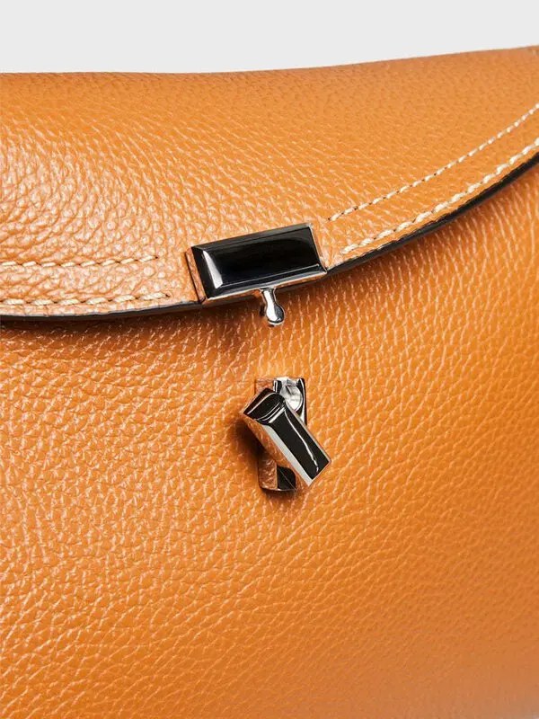 TOTEME Logo Plaque Foldover Top Crossbody Bag - Orange