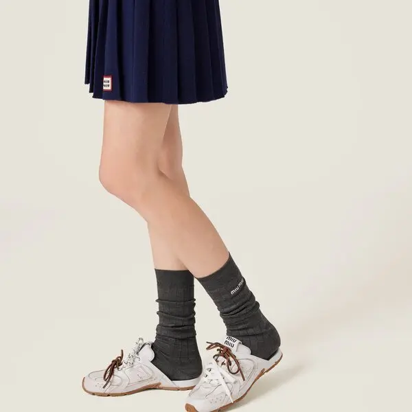 Miu Miu Pleated Mini Skirt With Logo Patch