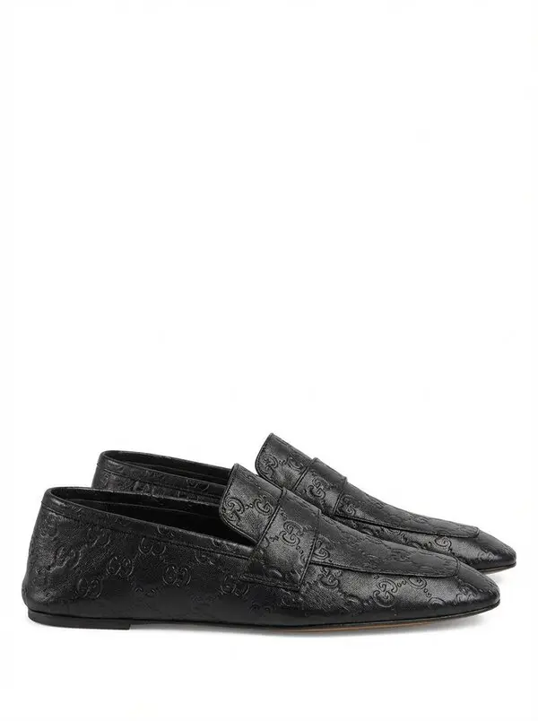 Gucci Logo Embossed Leather Loafers