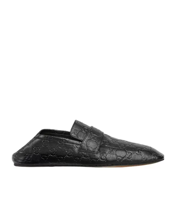 Gucci Logo Embossed Leather Loafers