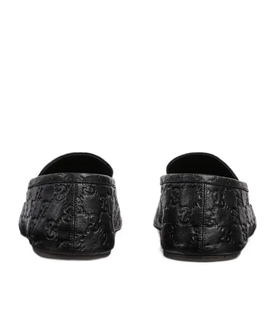 Gucci Logo Embossed Leather Loafers