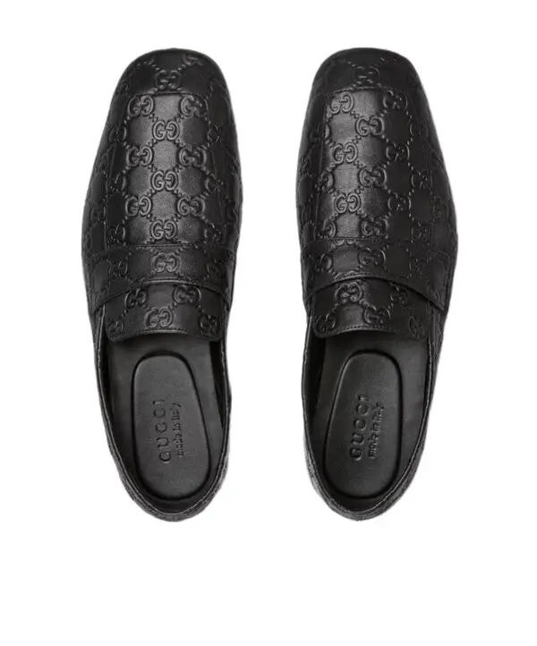 Gucci Logo Embossed Leather Loafers