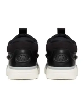 Valentino Garavani Logo Embossed Lace-up Sneakers - Black