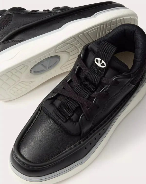 Valentino Garavani Logo Embossed Lace-up Sneakers - Black