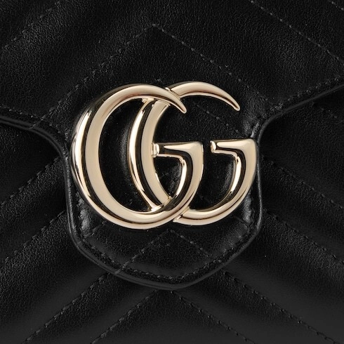Gucci Logo Plaque Quilted Clutch Bag