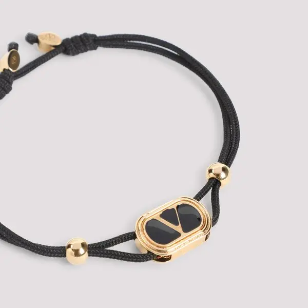 Valentino Garavani Gold Tone Logo Bracelet