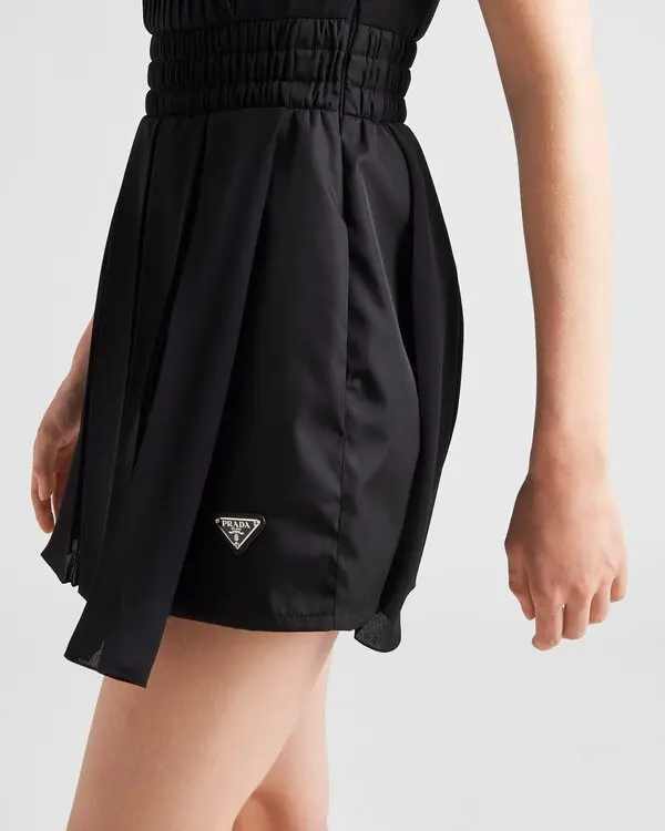 Prada Sablé And Re-nylon Sleeveless Jumpsuit With Pleated Details