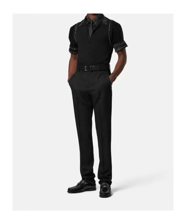 Versace Embellished Sleeveless Knitted Top With Peak Collar