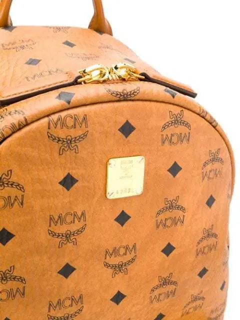 Mcm Stark All-over Logo Printed Medium Backpack - Orange