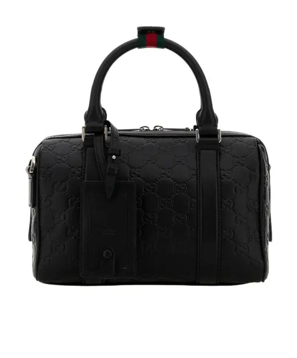 Gucci Monogram Embossed Leather Duffle Bag