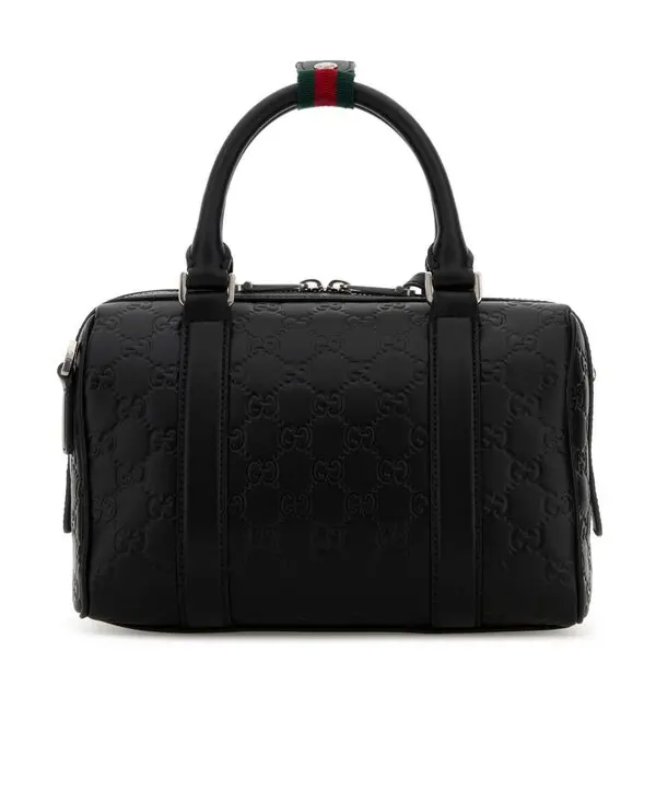 Gucci Monogram Embossed Leather Duffle Bag